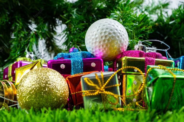🔥 Free Download Premium Photo Christmas Gift Box And Golf Ball On Grass ...